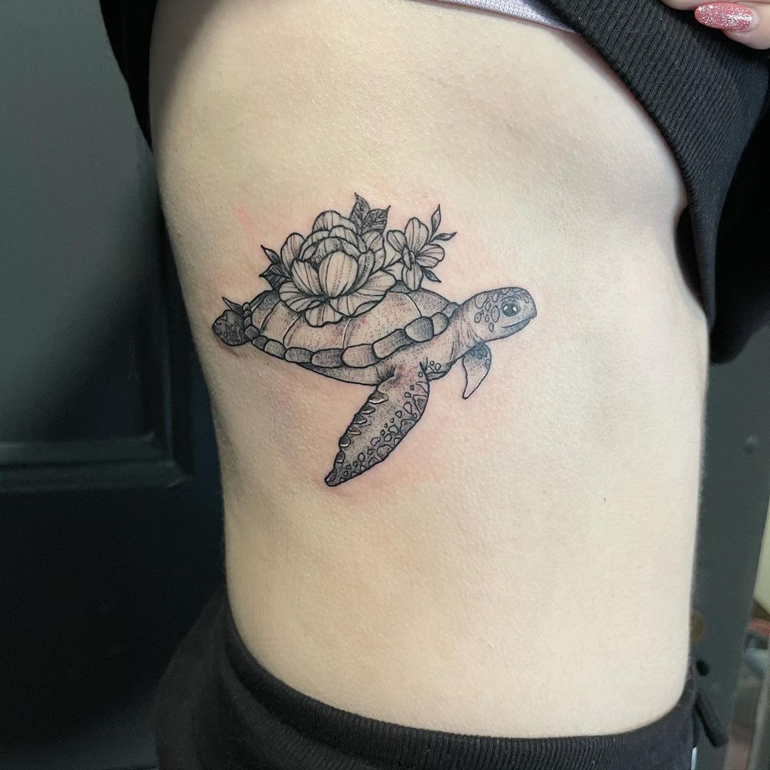 Getting A Rib Tattoo: Everything You Need To Know - Psycho Tats