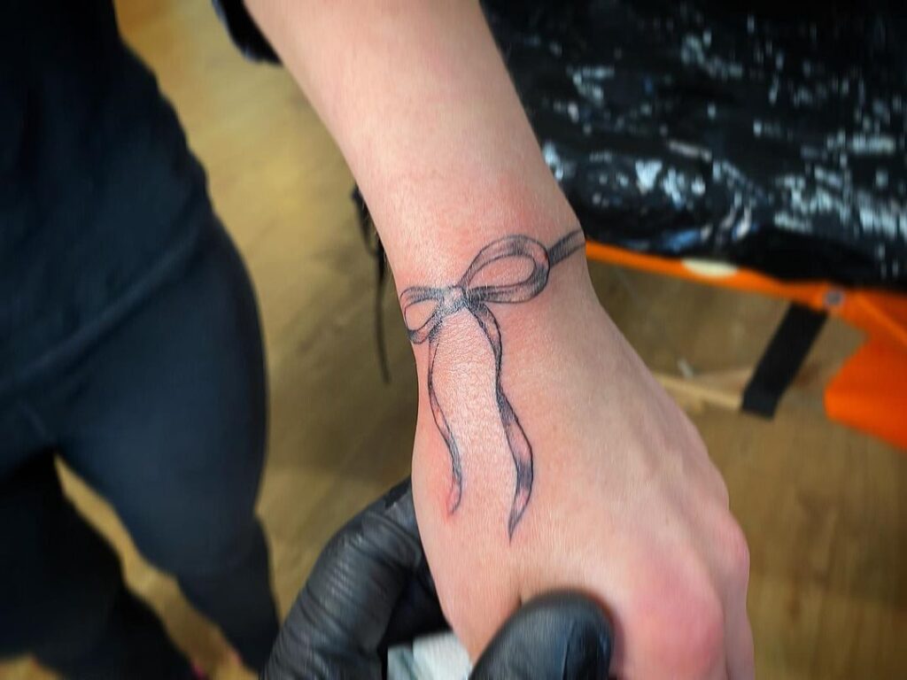 Bow-Inspired Ink: Women’s Symbol of Grace and Style - Psycho Tats