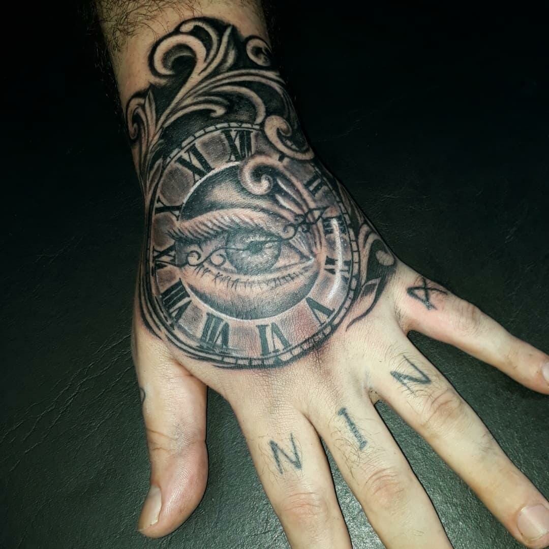 55 Striking Clock Tattoos on Hands for the Modern Man - Psycho Tats