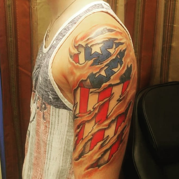 58 Shoulder-Mounted Flag Tattoos for a Patriotic Statement - Psycho Tats