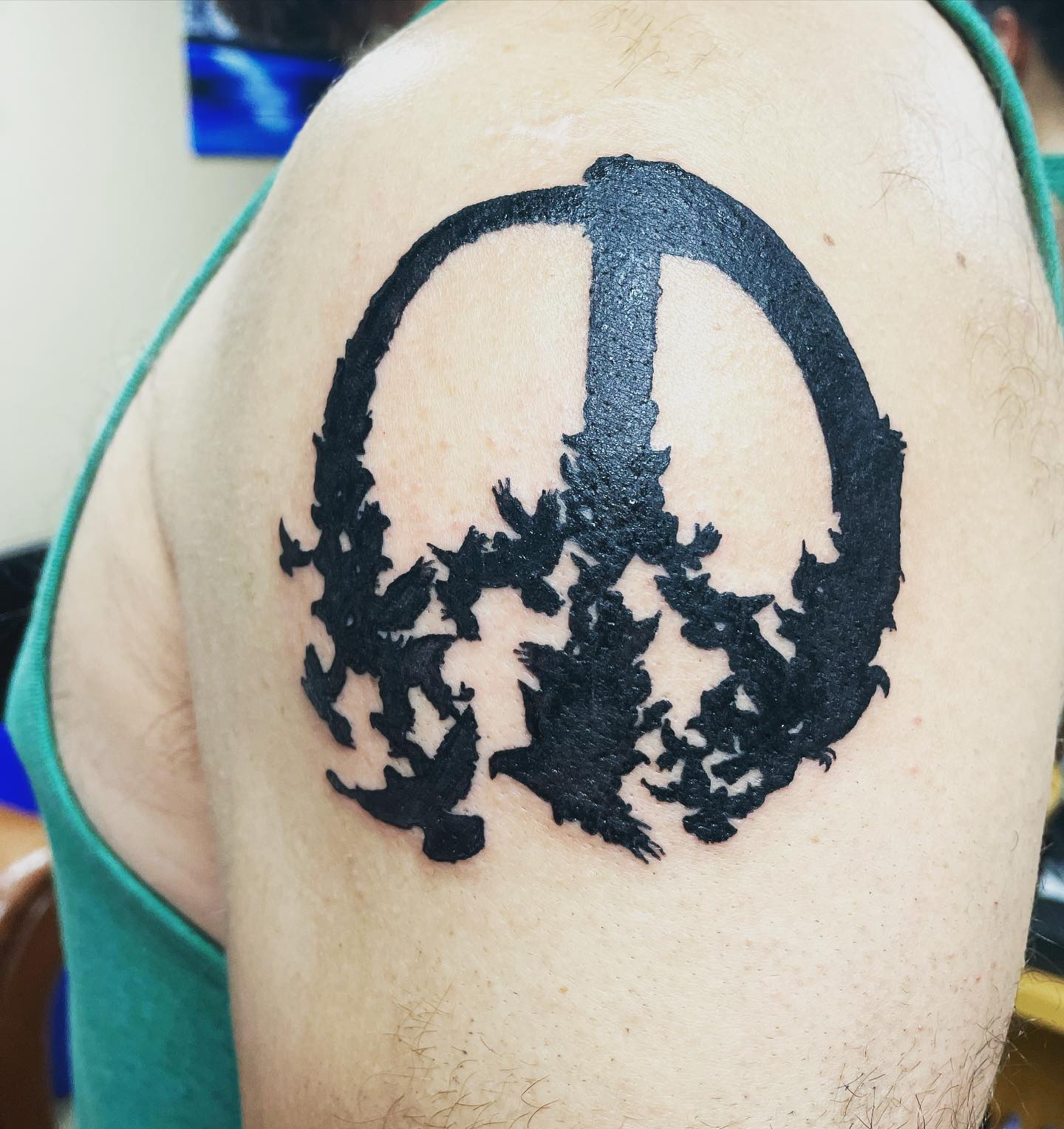 37 Tranquil Ink: Exploring the World of Peace Sign Tattoos - Psycho Tats