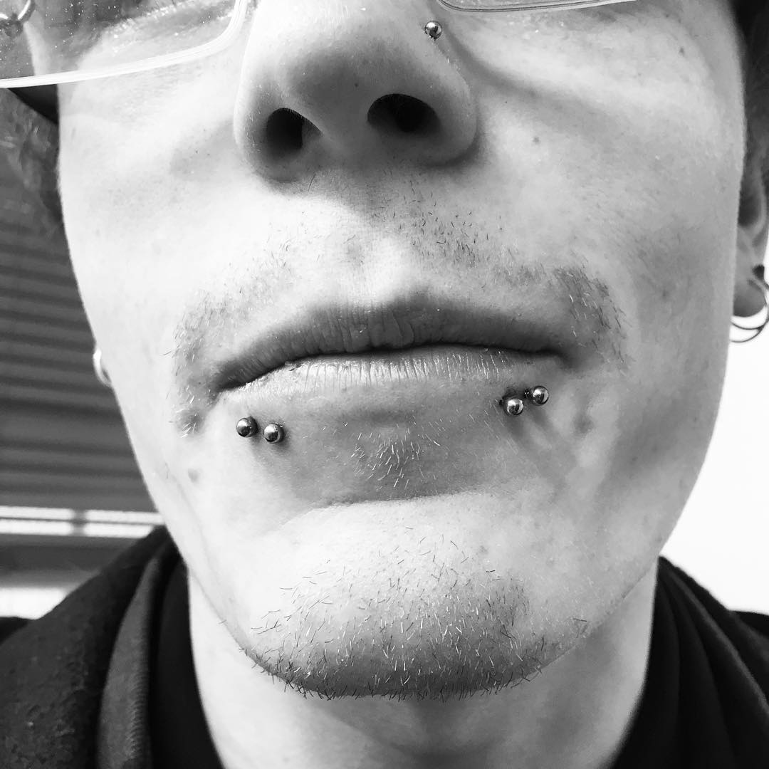 Sink Your Teeth into These 10 Eye-Catching Shark Bite Piercing Concepts ...