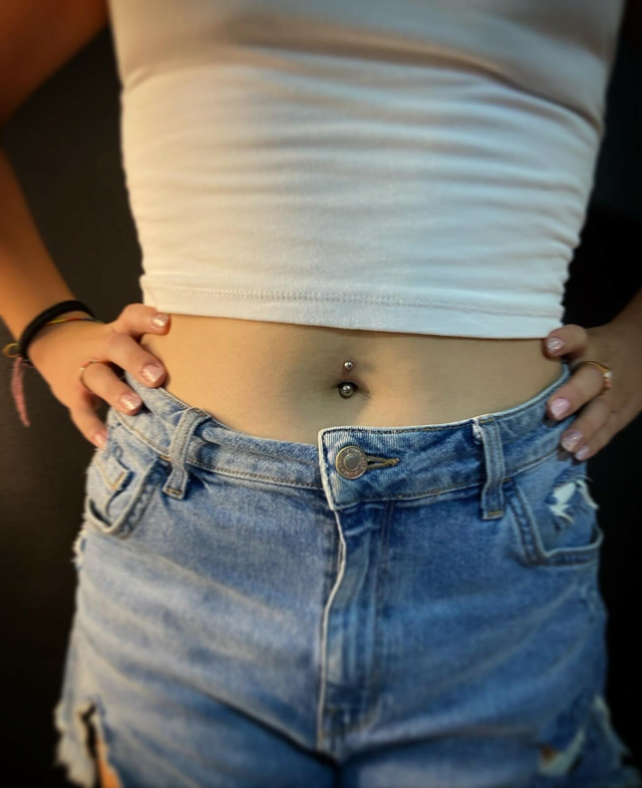Can You Swim With A Belly Button Piercing? - Psycho Tats