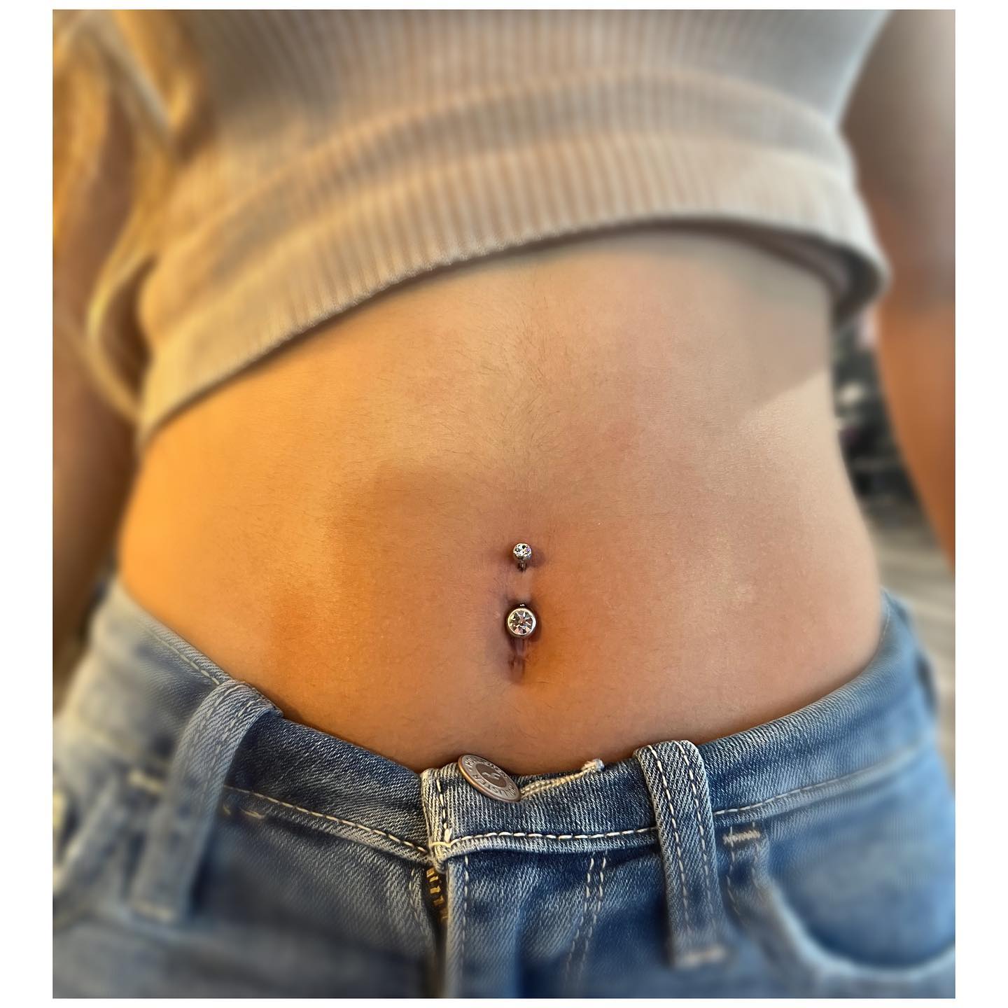 How To Take A Belly Ring Out? - Psycho Tats