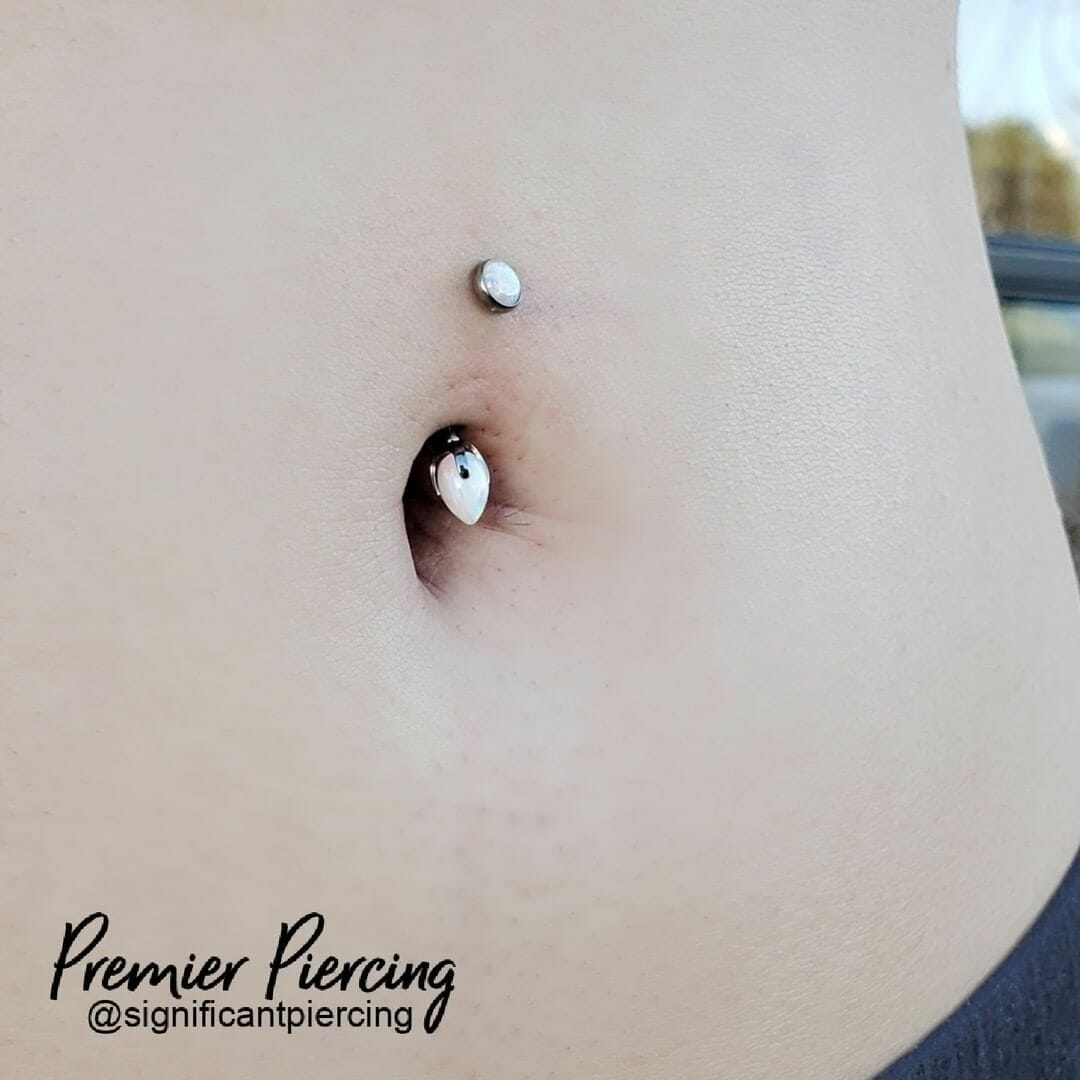 How To Reduce A Piercing Scar Around The Belly Button? - Psycho Tats