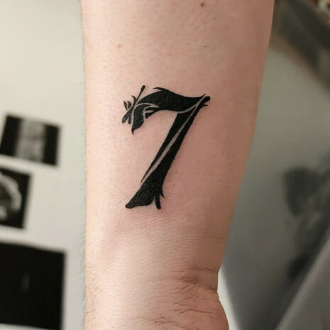 15 Magnificent Number 7 Tattoo Designs - Psycho Tats