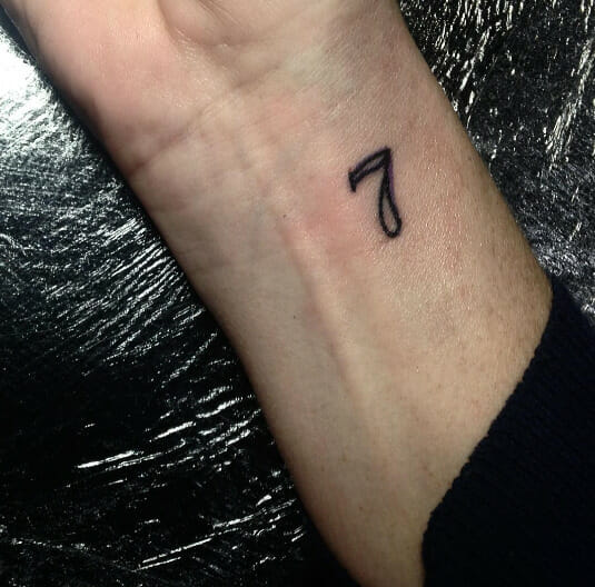 15 Magnificent Number 7 Tattoo Designs - Psycho Tats