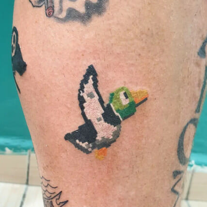 41 Duck Tattoo Inspirations for Nature-loving Ink Enthusiasts - Psycho Tats