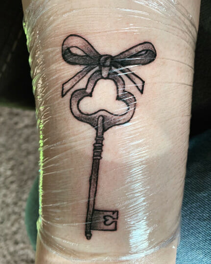 41 Skeleton Key Tattoo Designs Unlocking Passion with Ink - Psycho Tats