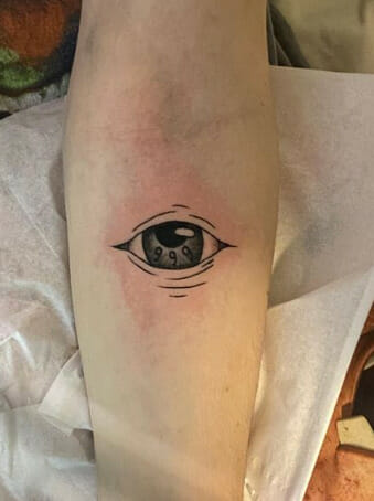 Decoding the Symbolism: The Meaning Behind 999 Number Tattoos - Psycho Tats