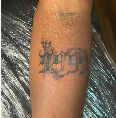 Decoding the Symbolism: The Meaning Behind 999 Number Tattoos - Psycho Tats