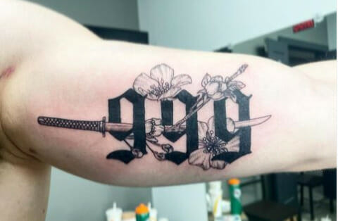 Decoding the Symbolism: The Meaning Behind 999 Number Tattoos - Psycho Tats