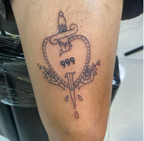 Decoding the Symbolism: The Meaning Behind 999 Number Tattoos - Psycho Tats