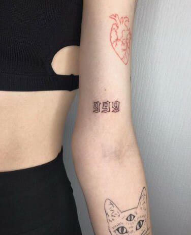 Decoding the Symbolism: The Meaning Behind 999 Number Tattoos - Psycho Tats