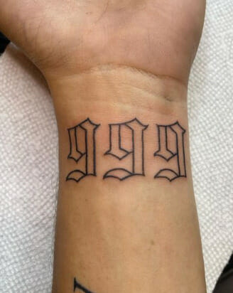 Decoding the Symbolism: The Meaning Behind 999 Number Tattoos - Psycho Tats