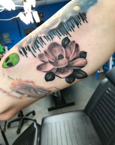 15 Alien Head Tattoo Designs That Are Out of This World - Psycho Tats