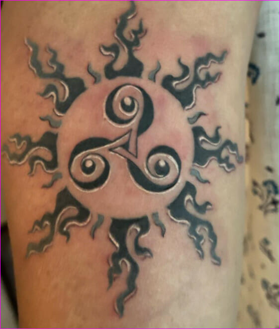 15 Triskele Tattoo Art Designs That Embrace the Power of Celtic ...