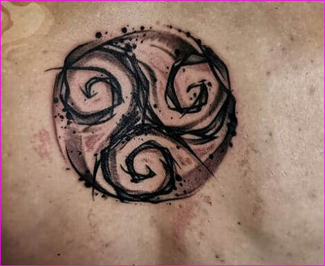 15 Triskele Tattoo Art Designs That Embrace the Power of Celtic ...