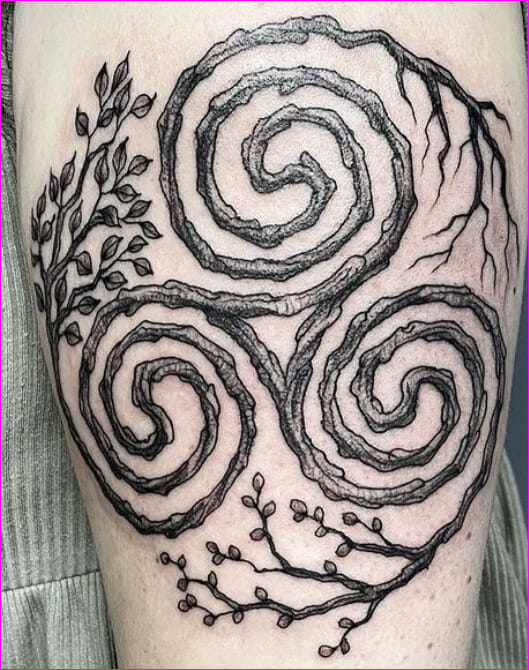 15 Triskele Tattoo Art Designs That Embrace the Power of Celtic ...