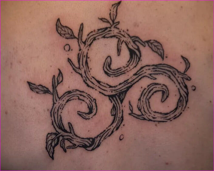 15 Triskele Tattoo Art Designs That Embrace the Power of Celtic ...