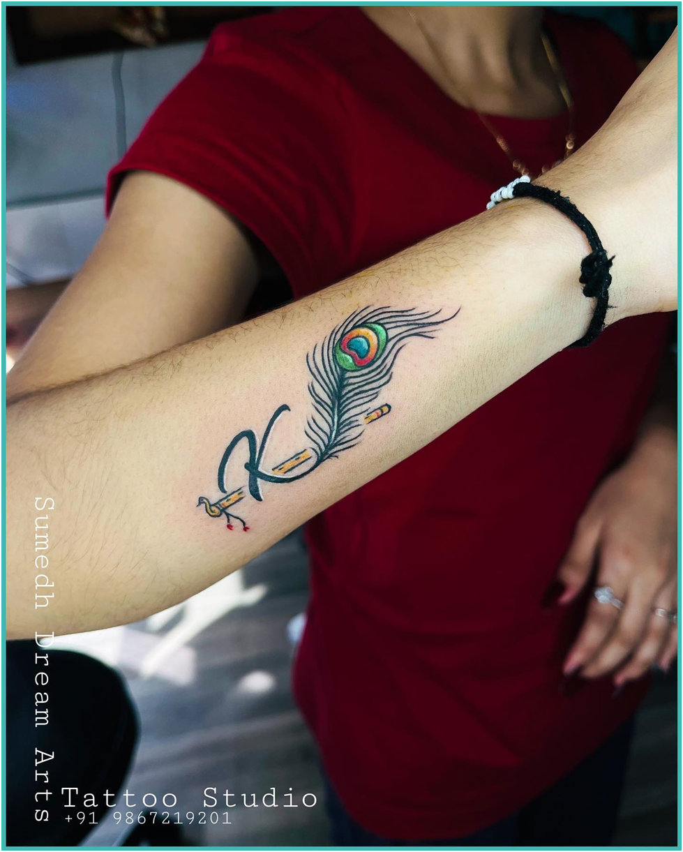 114 Mor Pankh Tattoo Ideas- Embracing Lord Krishna’s Beauty - Psycho Tats