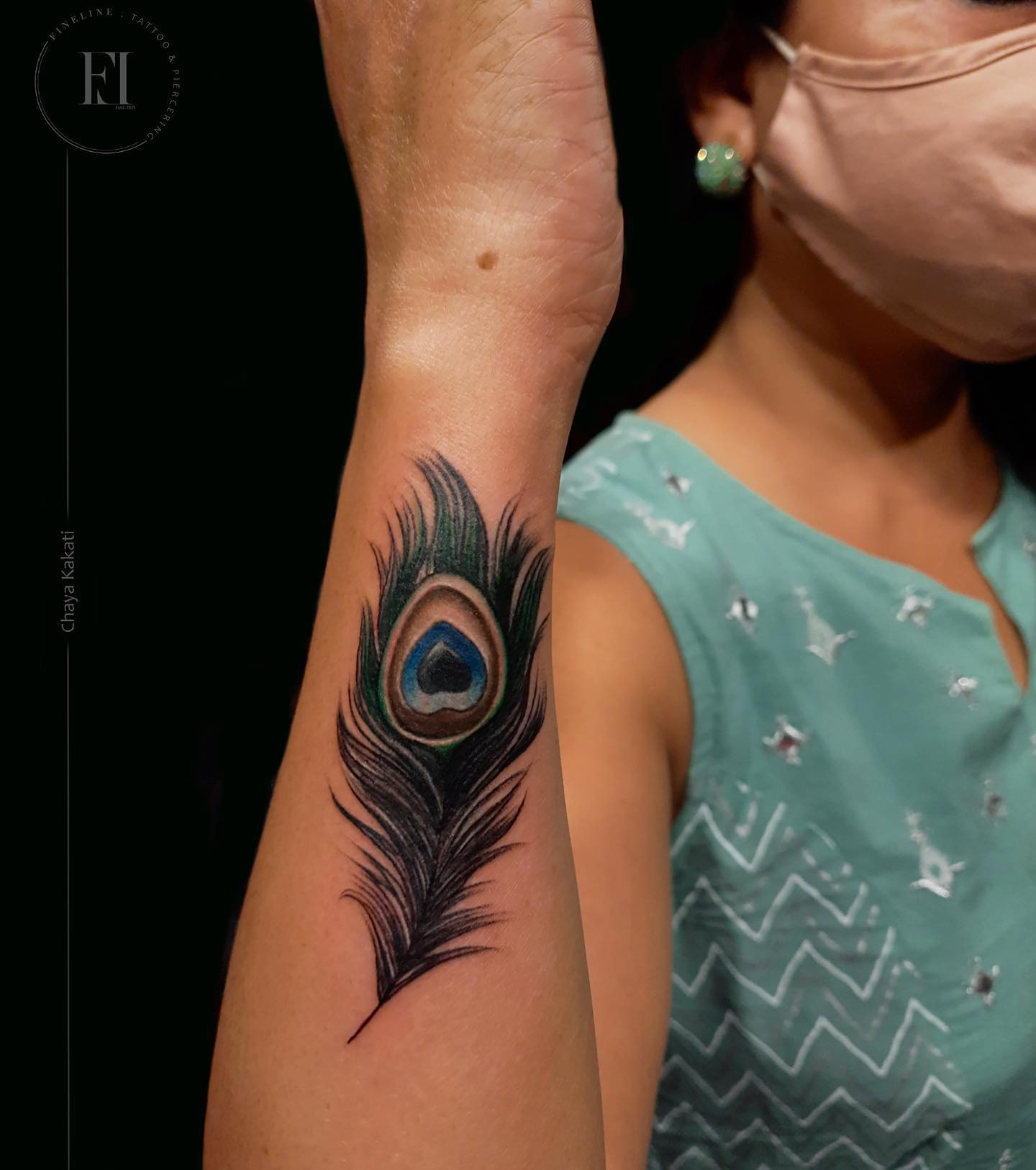 114 Mor Pankh Tattoo Ideas- Embracing Lord Krishna’s Beauty - Psycho Tats