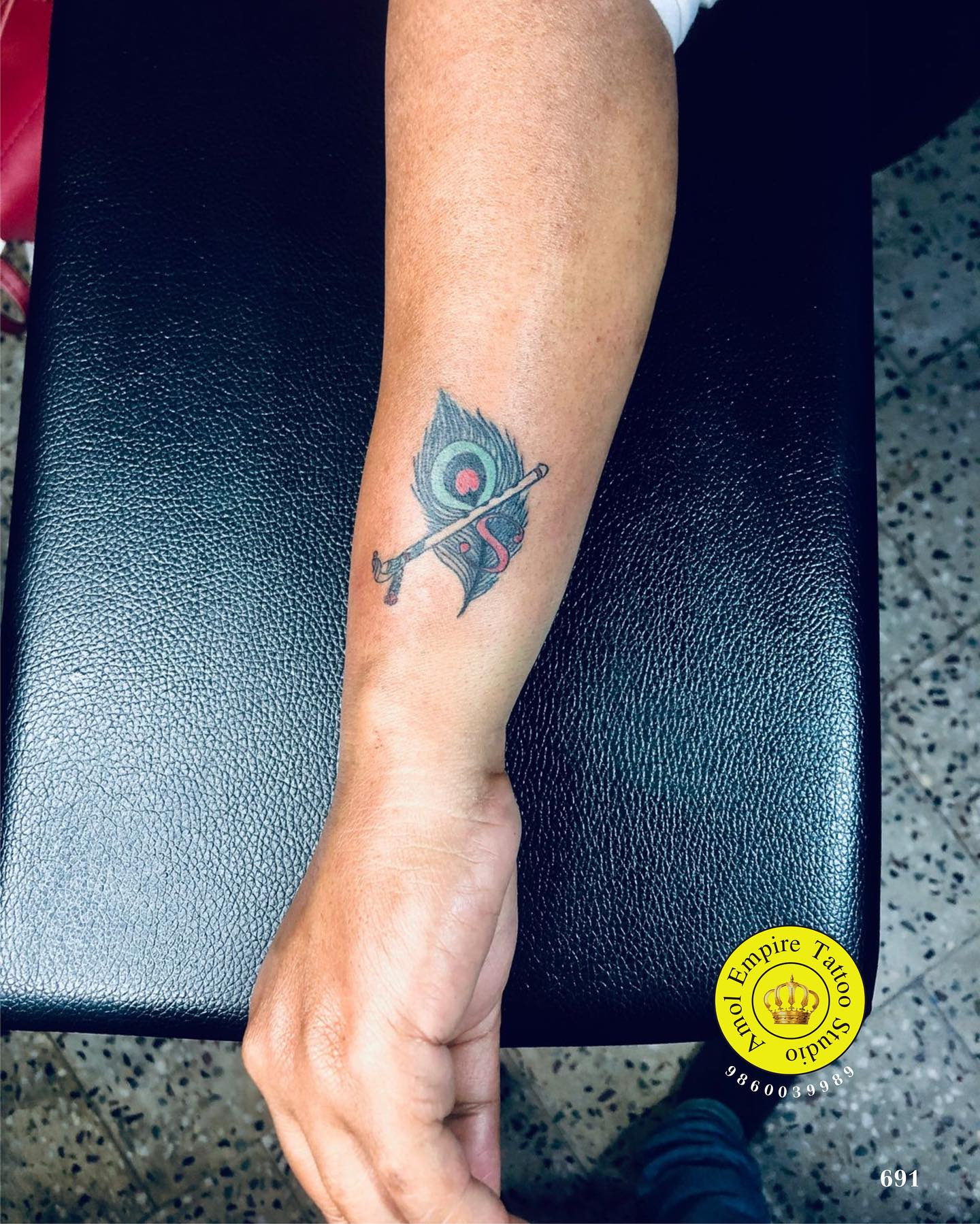 114 Mor Pankh Tattoo Ideas- Embracing Lord Krishna’s Beauty - Psycho Tats