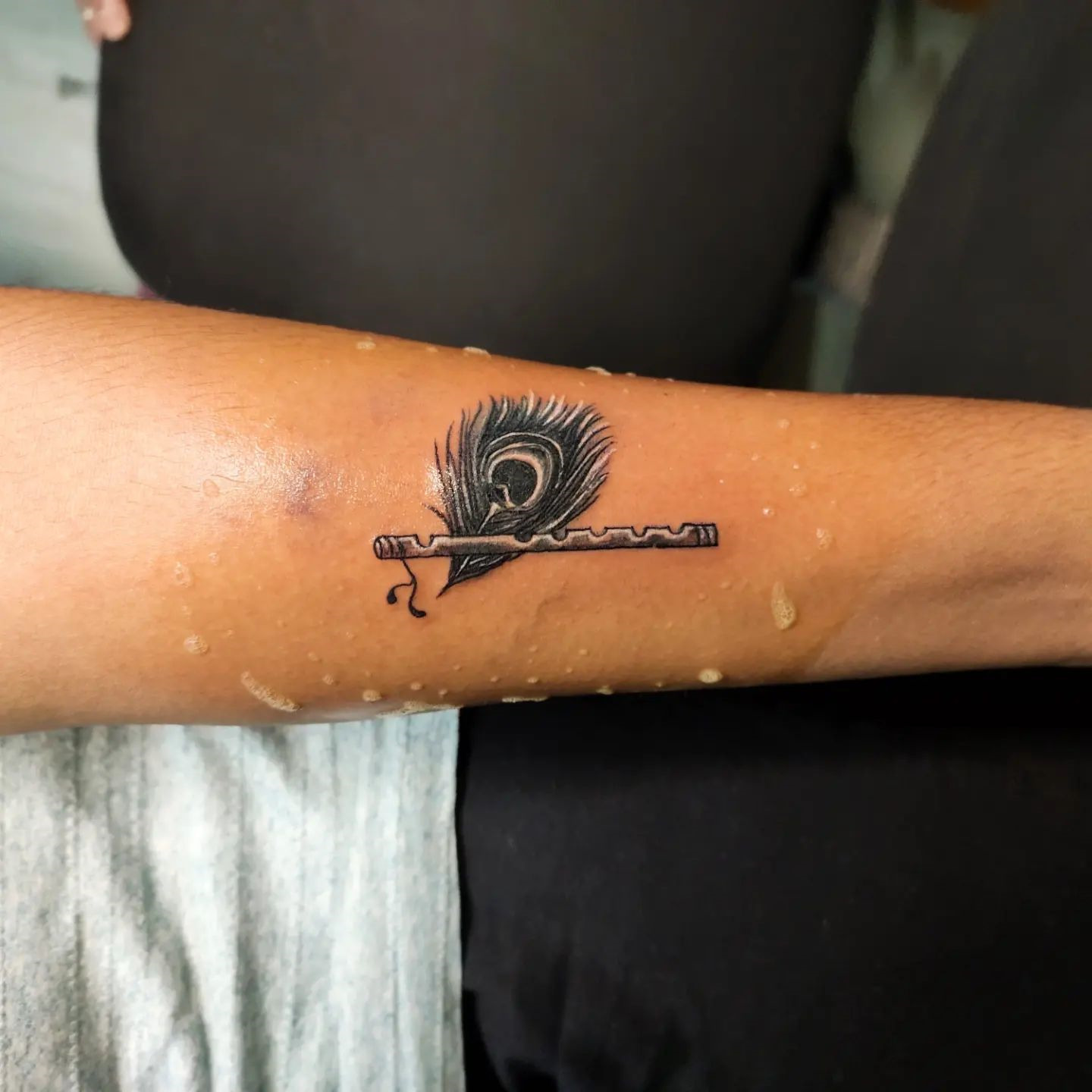 114 Mor Pankh Tattoo Ideas- Embracing Lord Krishna’s Beauty - Psycho Tats