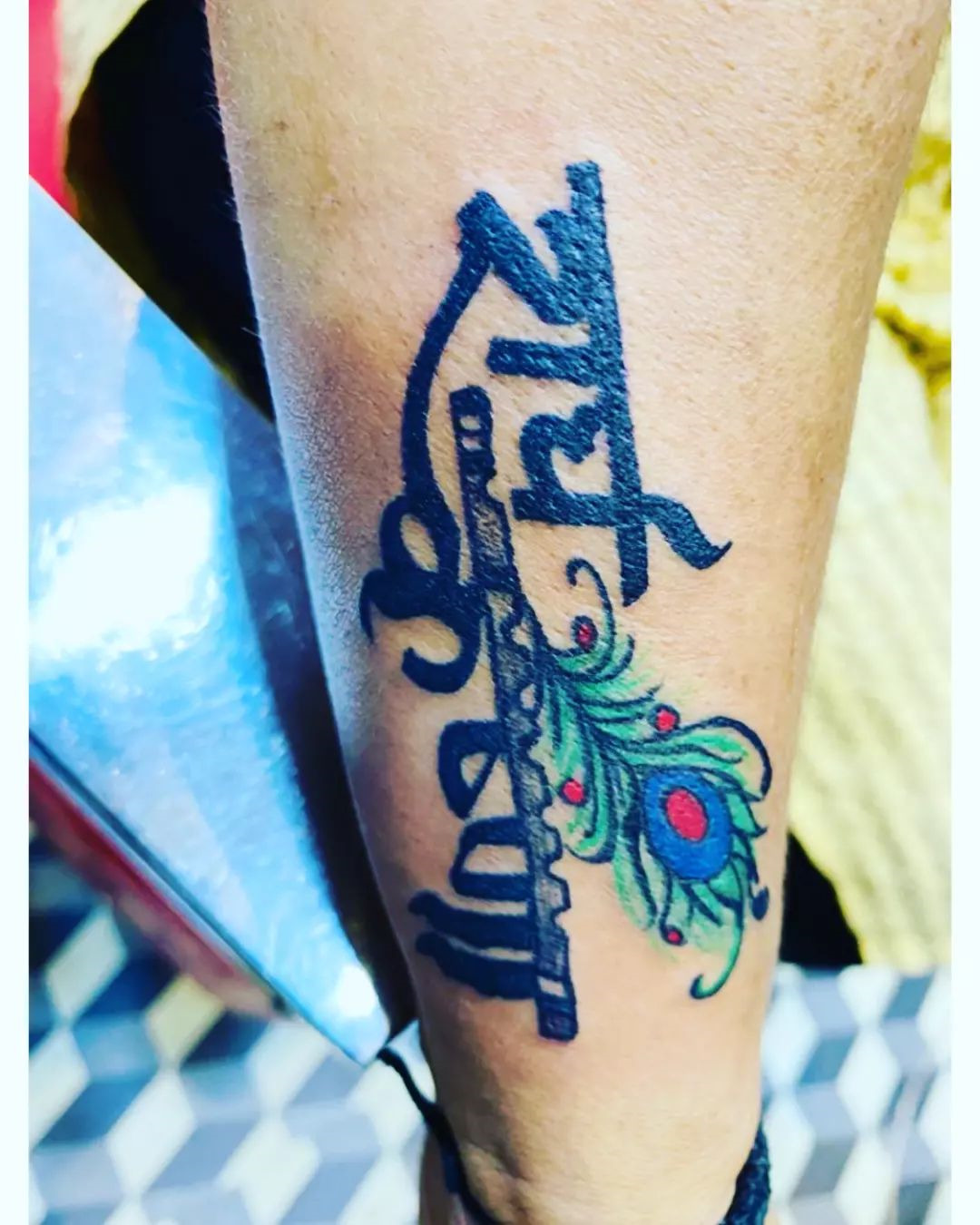 114 Mor Pankh Tattoo Ideas- Embracing Lord Krishna’s Beauty - Psycho Tats