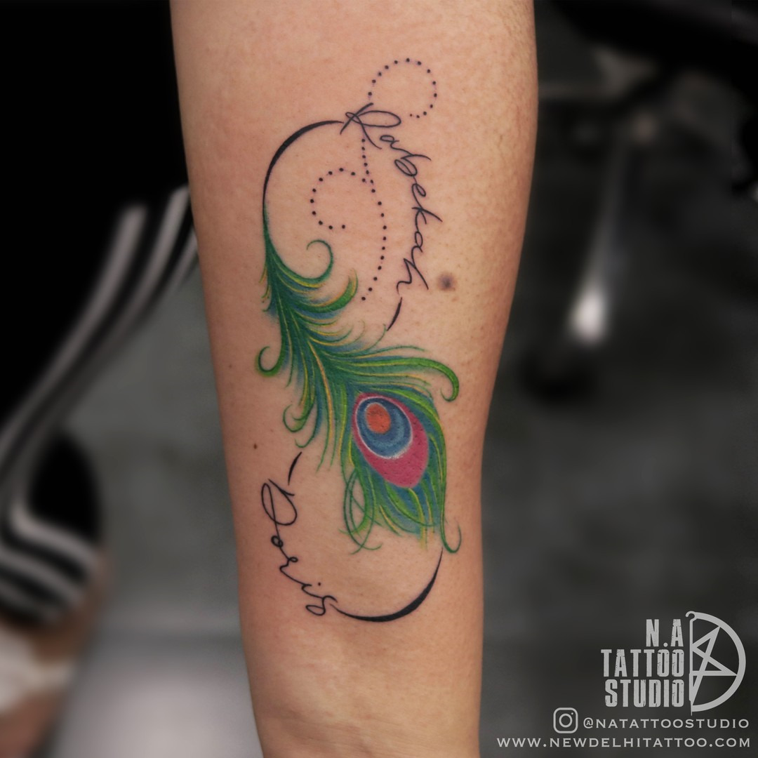 114 Mor Pankh Tattoo Ideas- Embracing Lord Krishna’s Beauty - Psycho Tats