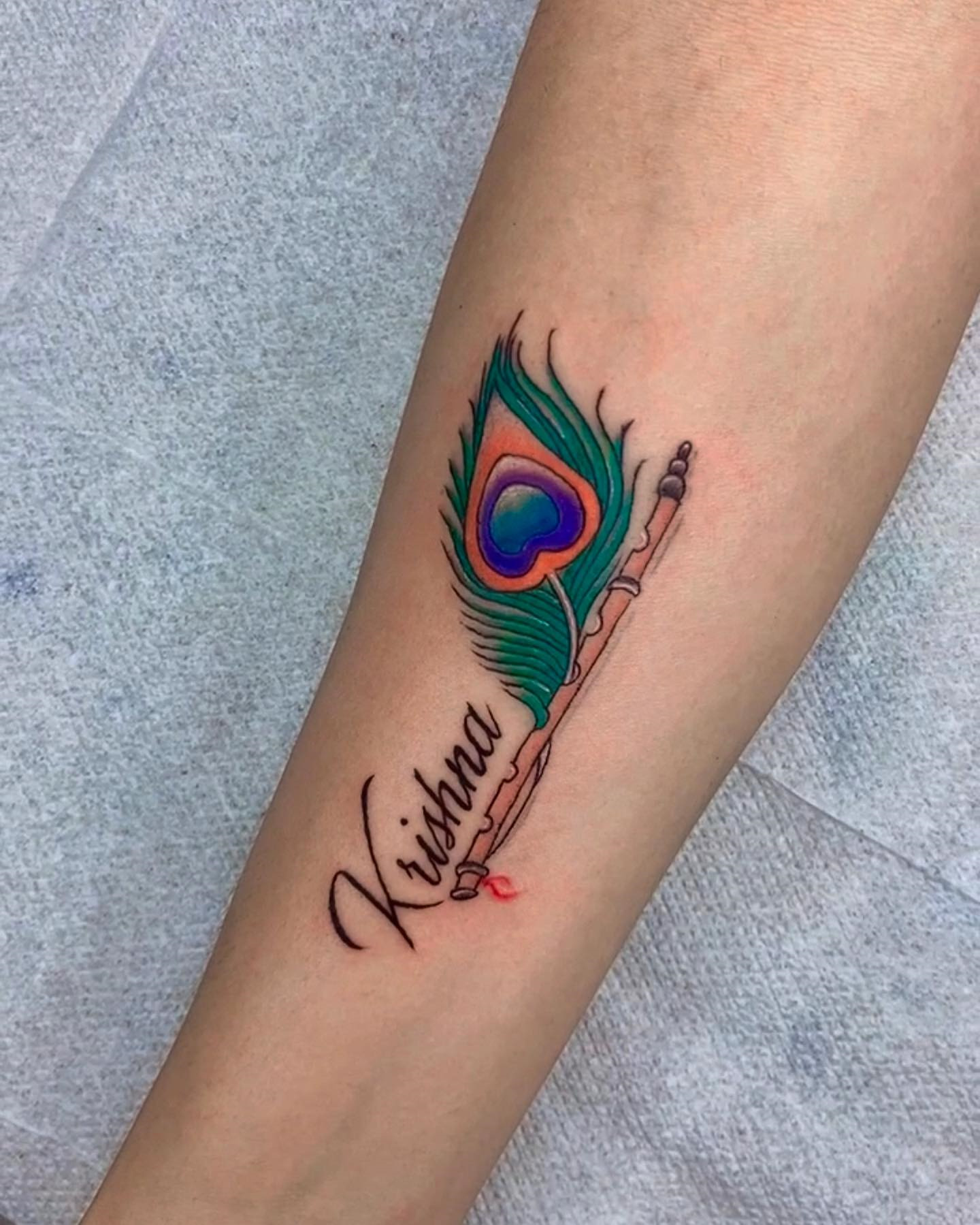 114 Mor Pankh Tattoo Ideas- Embracing Lord Krishna’s Beauty - Psycho Tats