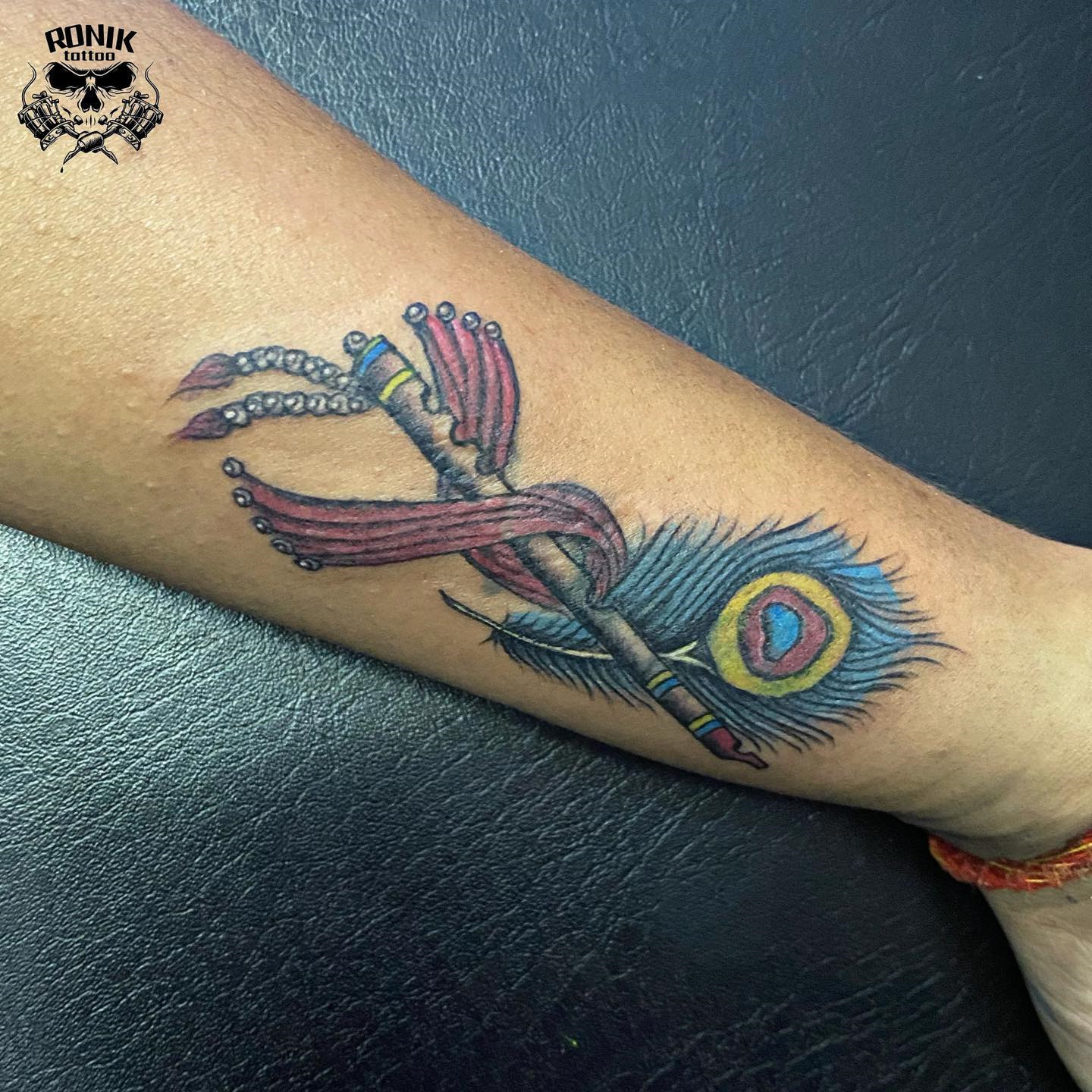 114 Mor Pankh Tattoo Ideas- Embracing Lord Krishna’s Beauty - Psycho Tats